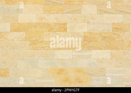 Brick wall of yellow shell rock. Closeup of shellstone texture ...