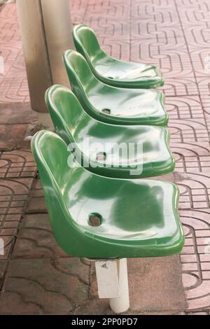 Green plastic chair at the bus stop For passengers waiting Stock Photo ...