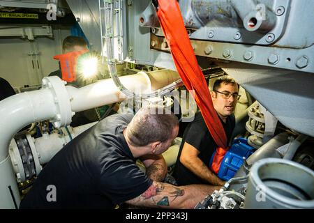 Royal Canadian Navy engineering personnel onboard HMCS Margaret Brooke ...