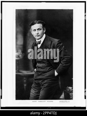 Harry 'Handcuff' Houdini. Circa 1913. Three-quarter length portrait ...