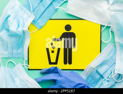 Throwing bin symbol medical masks Stock Photo - Alamy