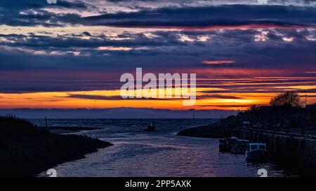 Boat sailing from Brora harbour Stock Photo - Alamy