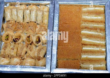 Different shapes of Baklava covered and stuffed with pistachios and ...