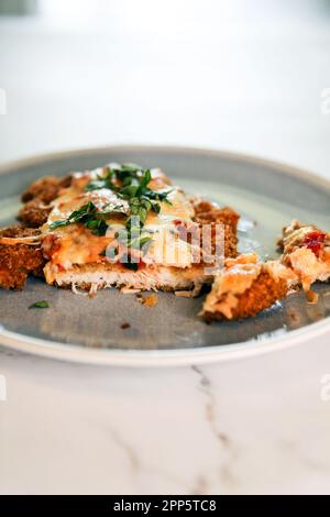 Chicken parma, Australian pub food Stock Photo - Alamy