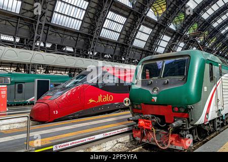 An Italo high speed train next to a Trenitalia ETR 700 under the grand ...