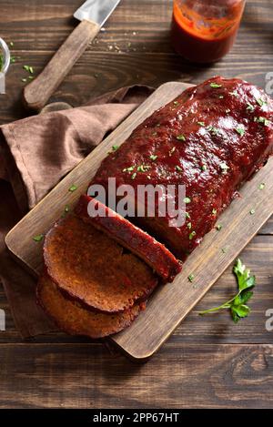 Cutting a fresh meat loaf Stock Photo - Alamy