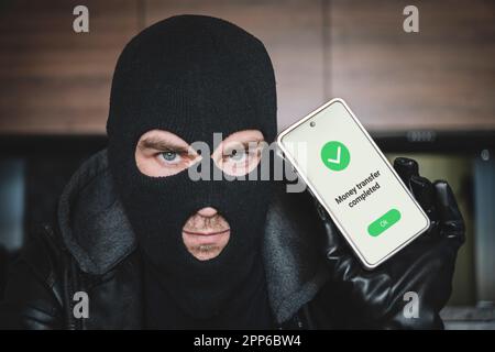 Mobile banking hack and cyber security concept. Hacker and criminal ...