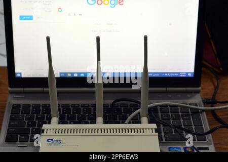 Cairo, Egypt, April 8 2023: A broadband wireless wifi and LAN router ...