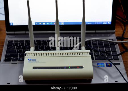 Cairo, Egypt, April 8 2023: A broadband wireless wifi and LAN router ...