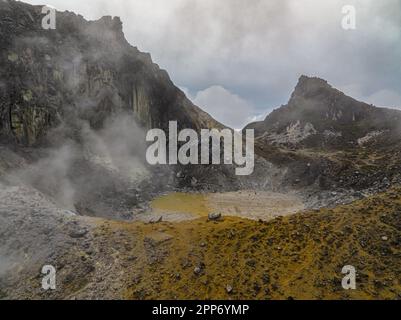 Aerial view of slope of Sibayak volcano with volcanic activity and ...