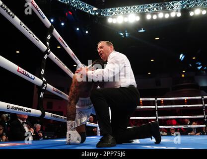 The referee stops the fight after Luke Watkins is knocked down in the ...