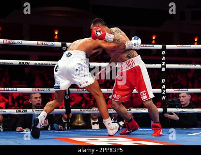 Joe Cordina (left) and Shavkatdzhon Rakhimov in the IBF World Super Feather weight bout at ...