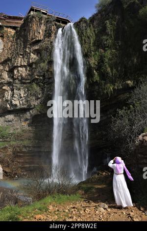 Beirut, Lebanon. 22nd Apr, 2023. A girl walks to the Jezzine Waterfall ...