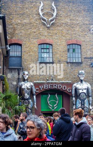 Giant robot statues outside Cyberdog shop in Camden market, Camden ...