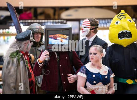 Attendees take part in a cosplay competition during the Sci Fi ...