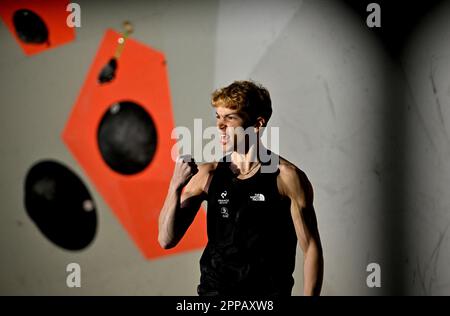 Mejdi Schalck of France celebrates after winning the men's boulder ...