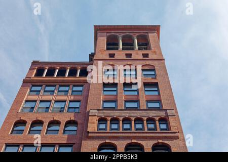 Morgan Lofts’ deep red brick façade and lofty colonnade are a sharp ...