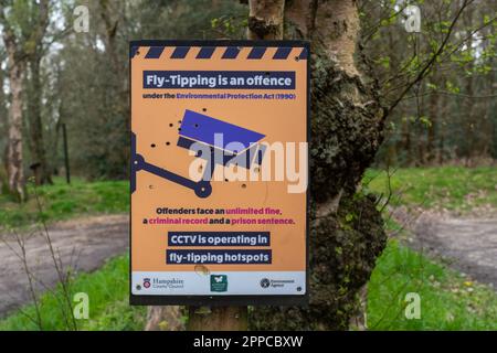 Fly-tipping warning sign in the UK countryside Stock Photo - Alamy