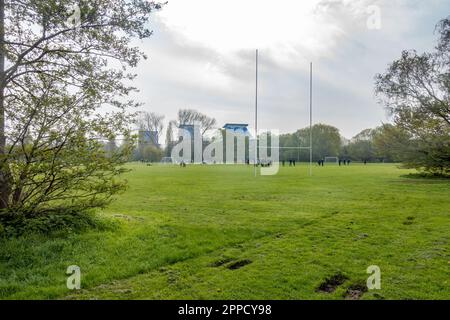 A view looking across sports fields with rugby and football goals at ...