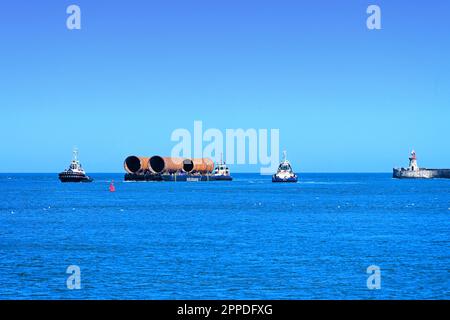 Multratug 19 towing the barge Bokabarge 7 into the river Tyne with some ...