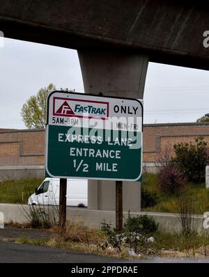FasTrak Only express lane road sign. FasTrak is an electronic toll ...