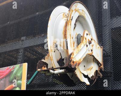 Rusted garden hose reel Stock Photo - Alamy