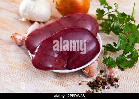Fresh raw pork kidneys on white background Stock Photo - Alamy