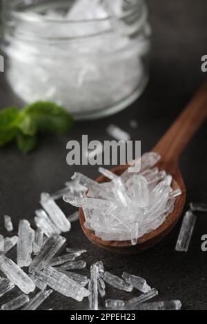 Menthol crystals in jar on white background Stock Photo - Alamy