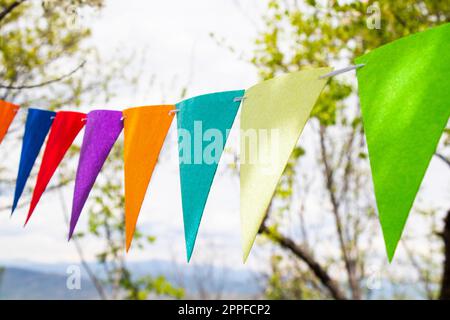 Party flags in yard, colorful flags Stock Photo - Alamy