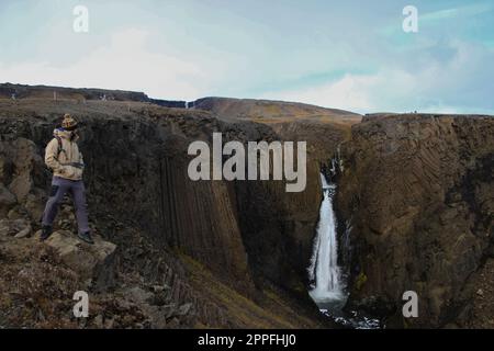 Detail of the Litlanesfoss waterfall in Iceland with its basalt columns ...