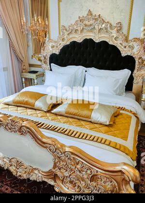 Abstract luxury rich bed in royal style Stock Photo - Alamy