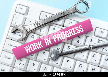 Handwriting text Work In Progress. Conceptual photo unfinished project ...