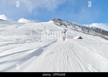 Ski lift pulling Stock Photo - Alamy