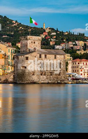 The ancient castle of Rapallo, built on the ligurian sea illuminated by ...