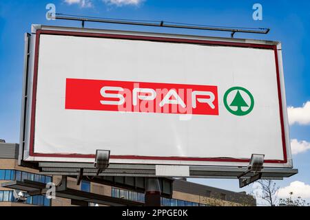 Advertisement billboard displaying logo of SPAR Stock Photo - Alamy