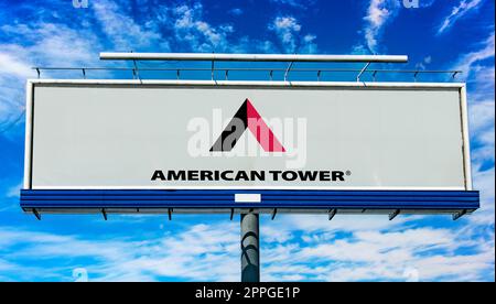 Advertisement billboard displaying logo of American Tower Stock Photo ...
