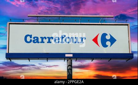 Advertisement billboard displaying logo of Carrefour Stock Photo - Alamy