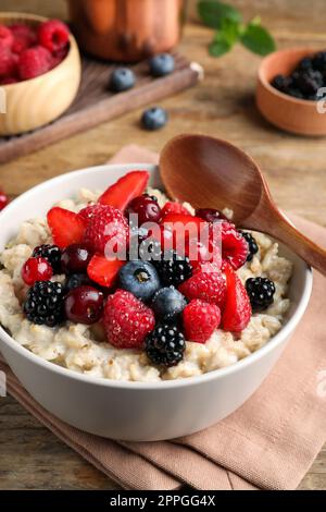 Breakfast - oat porridge with raspberry served mint Stock Photo - Alamy
