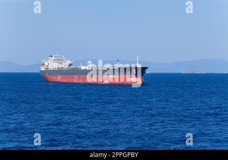 Merchant vessels and cargo container Stock Photo - Alamy