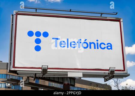 Advertisement billboard displaying logo of Telefonica Stock Photo - Alamy