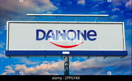 Advertisement billboard displaying logo of Danone Stock Photo - Alamy