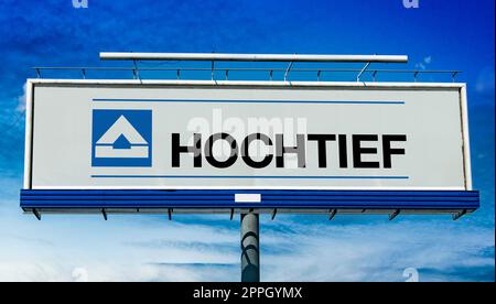 Advertisement billboard displaying logo of Hochtief Stock Photo - Alamy