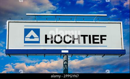 Advertisement billboard displaying logo of Hochtief Stock Photo - Alamy