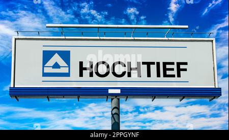 Advertisement billboard displaying logo of Hochtief Stock Photo - Alamy