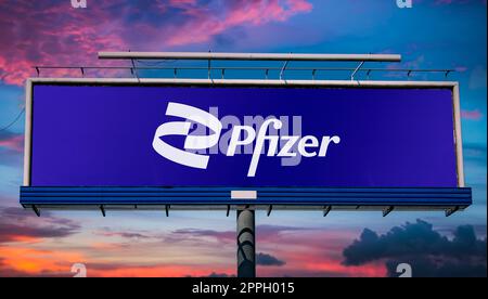Advertisement billboard displaying logo of Pfizer Stock Photo - Alamy