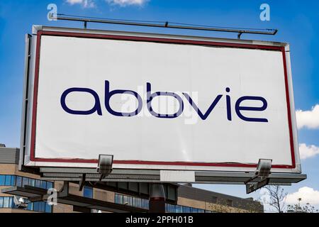 Advertisement billboard displaying logo of AbbVie Stock Photo - Alamy