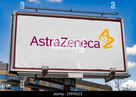 Advertisement billboard displaying logo of AstraZeneca Stock Photo - Alamy