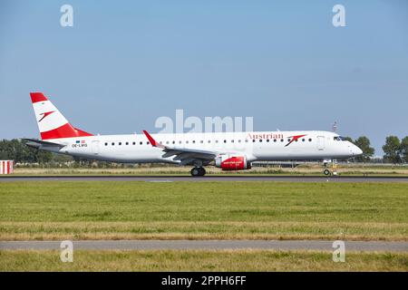 Amsterdam Airport Schiphol - Embraer E195LR of Austrian Airlines lands ...
