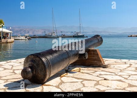 Cannon in port of Kassiopi, Corfu, Greece Stock Photo - Alamy