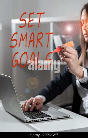 Hand writing sign Smart Goals, Business approach mnemonic used as a ...